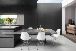 Sleek Kitchen Design Compliments Asymmetric Architecture | SBID